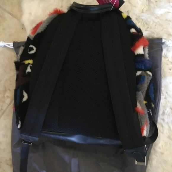 Fendi | Bags | Fendi Shearling Patchwork Monster Eyes Backpack Black ...